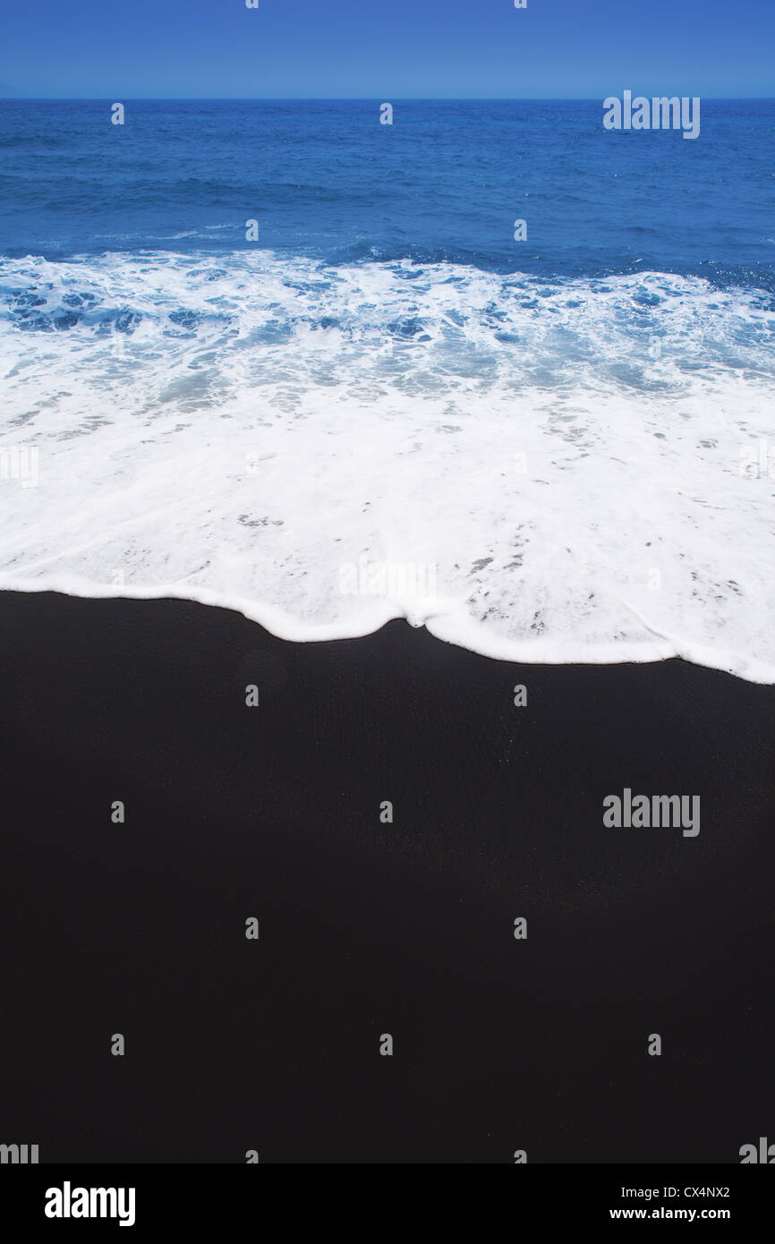 Black sand beach volcanic in Tenerife at Canary Islands Stock Photo - Alamy