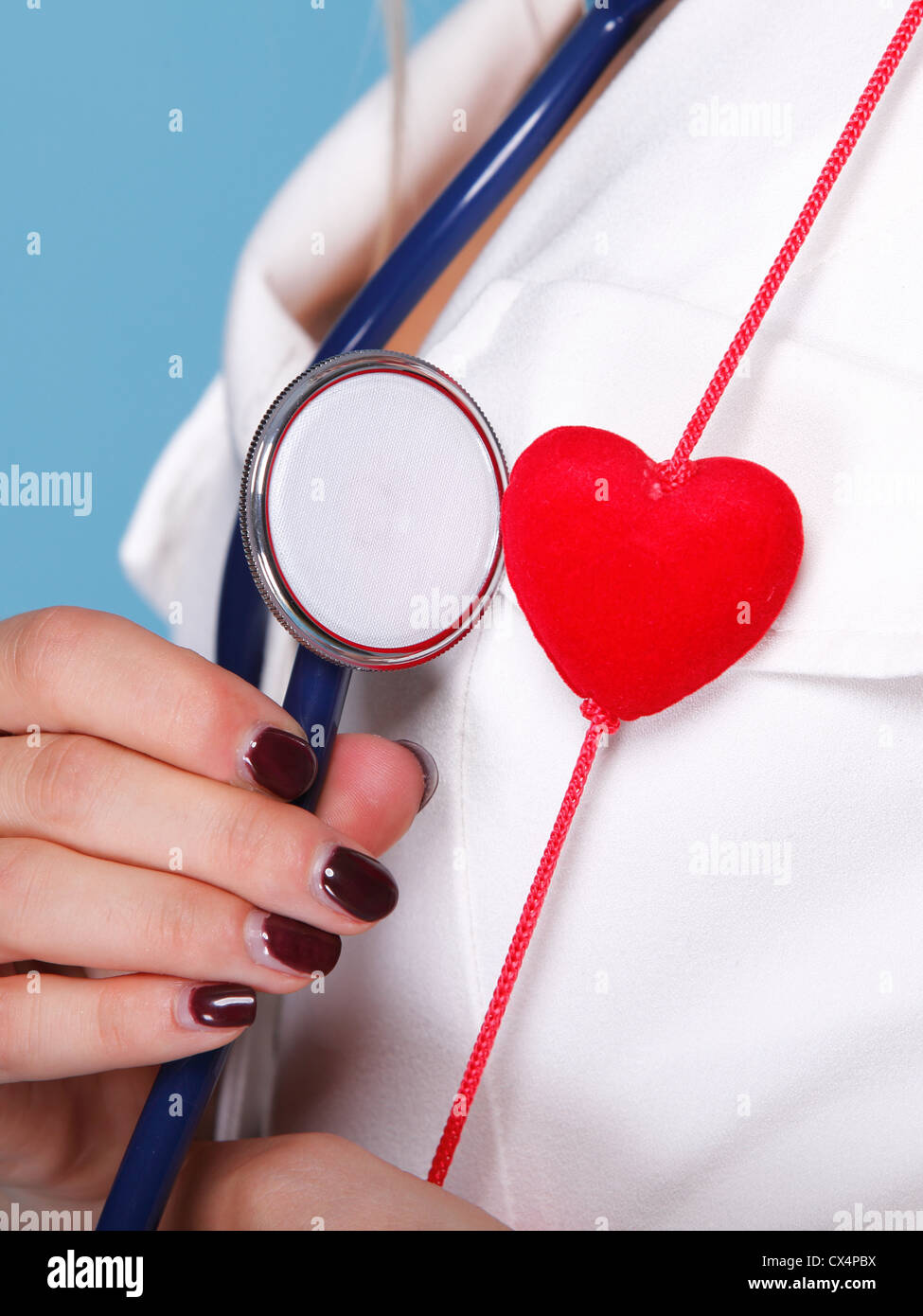 red heart woman in nurse suit with stethoscope blue background Stock ...