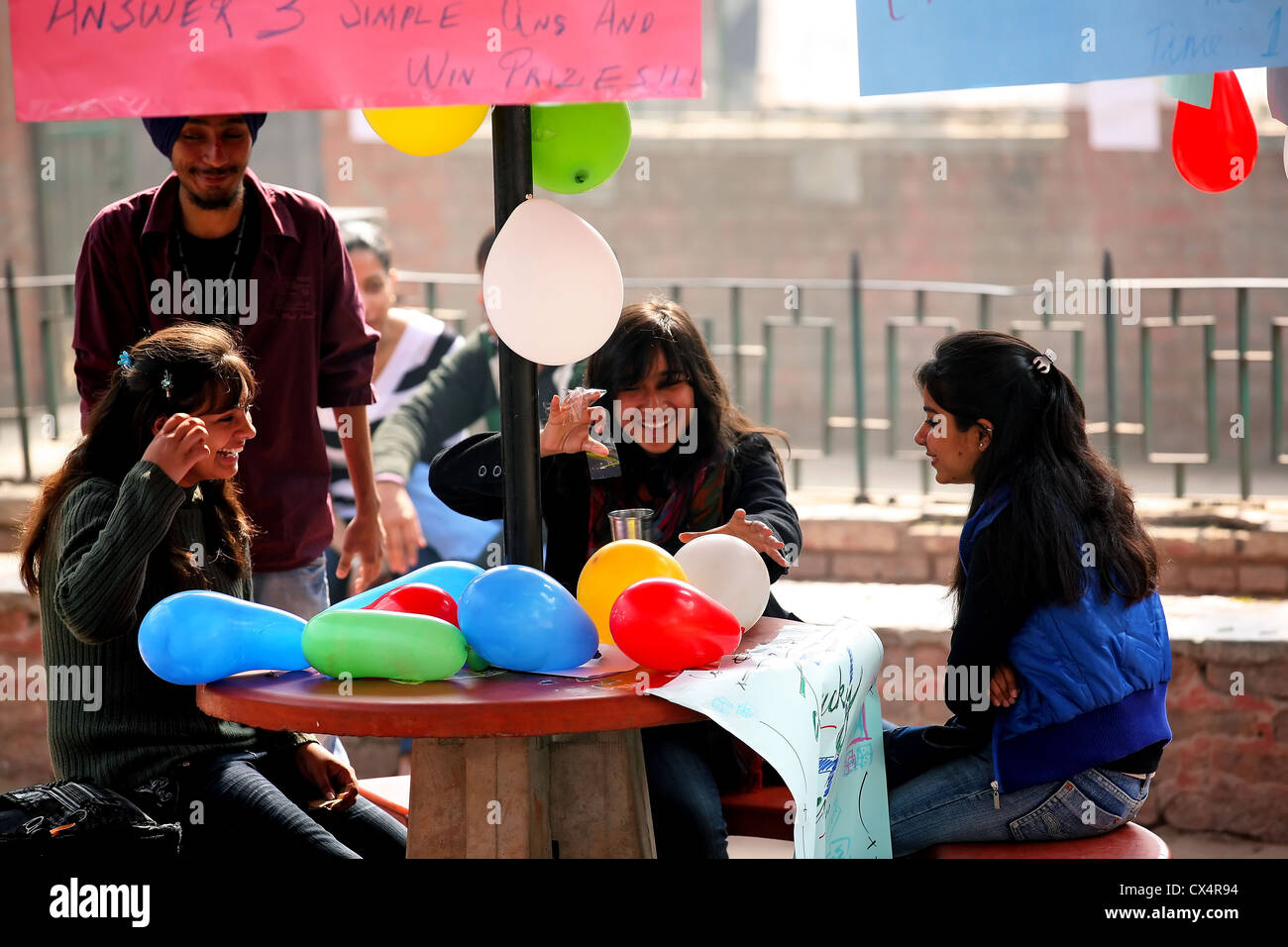 Happy friends having fun at Collage campus Stock Photo - Alamy