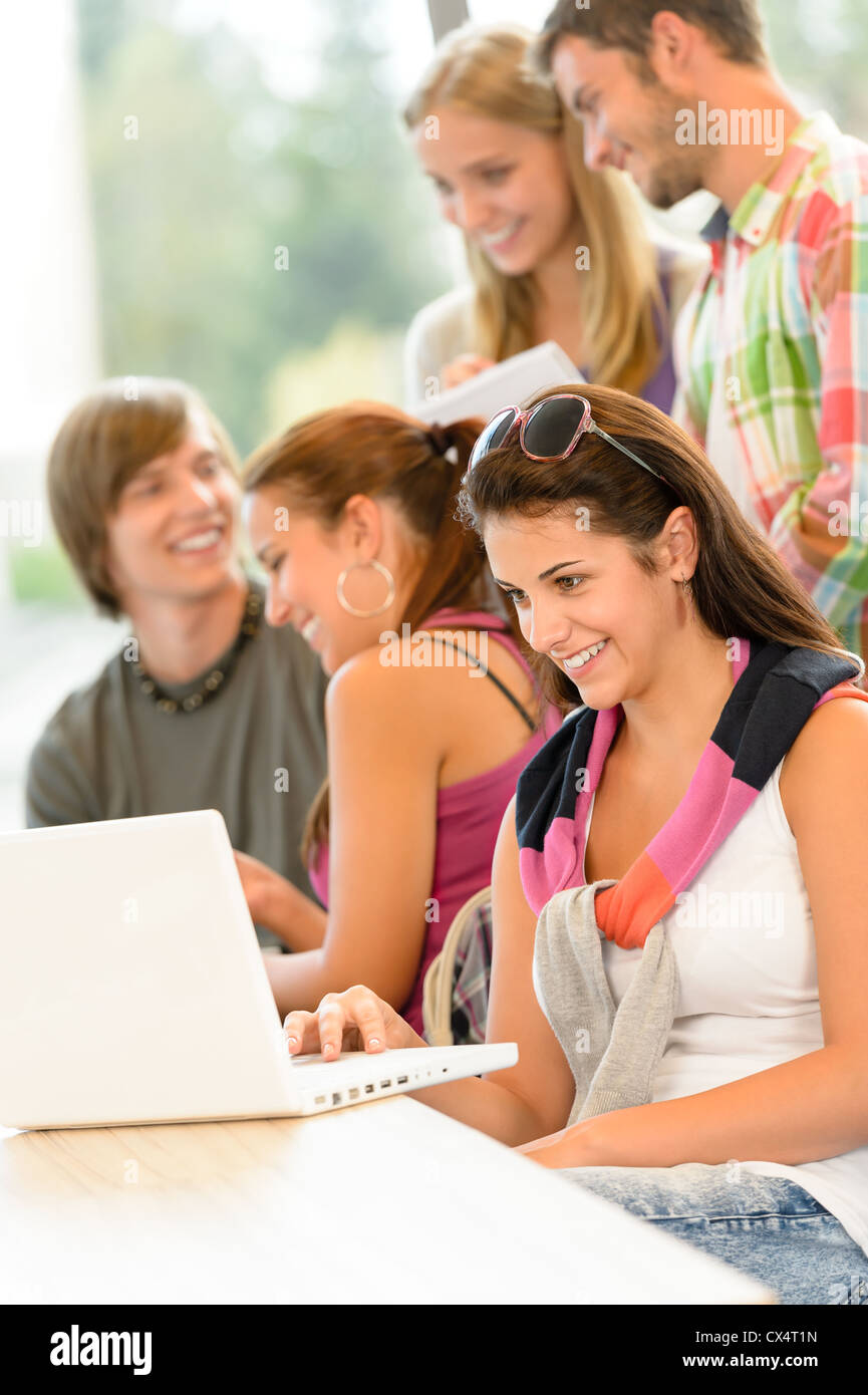 High-school study group learning in library class students teen smiling ...