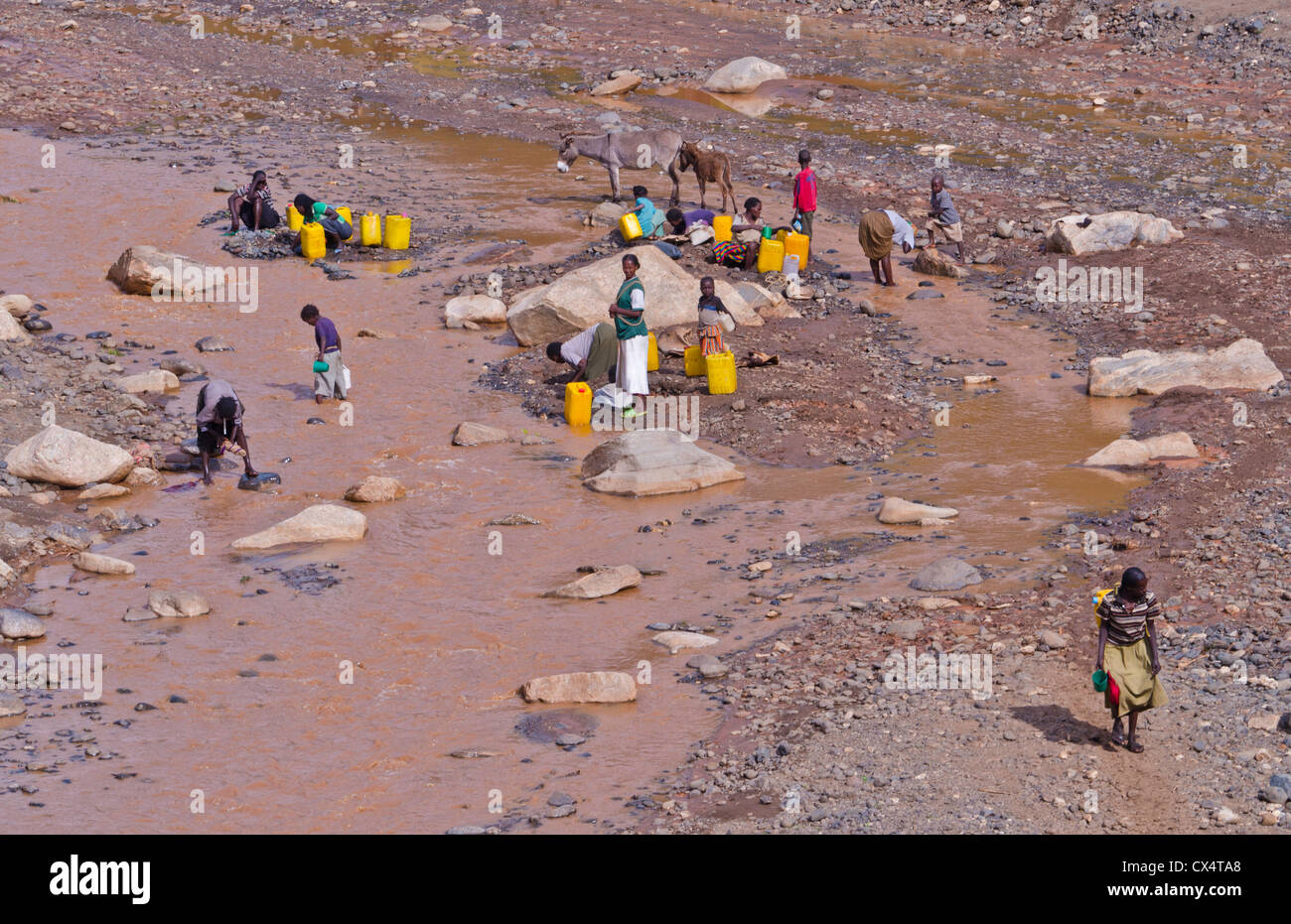 Derashe Ethiopia Africa women getting water from river in mud Derashe ...