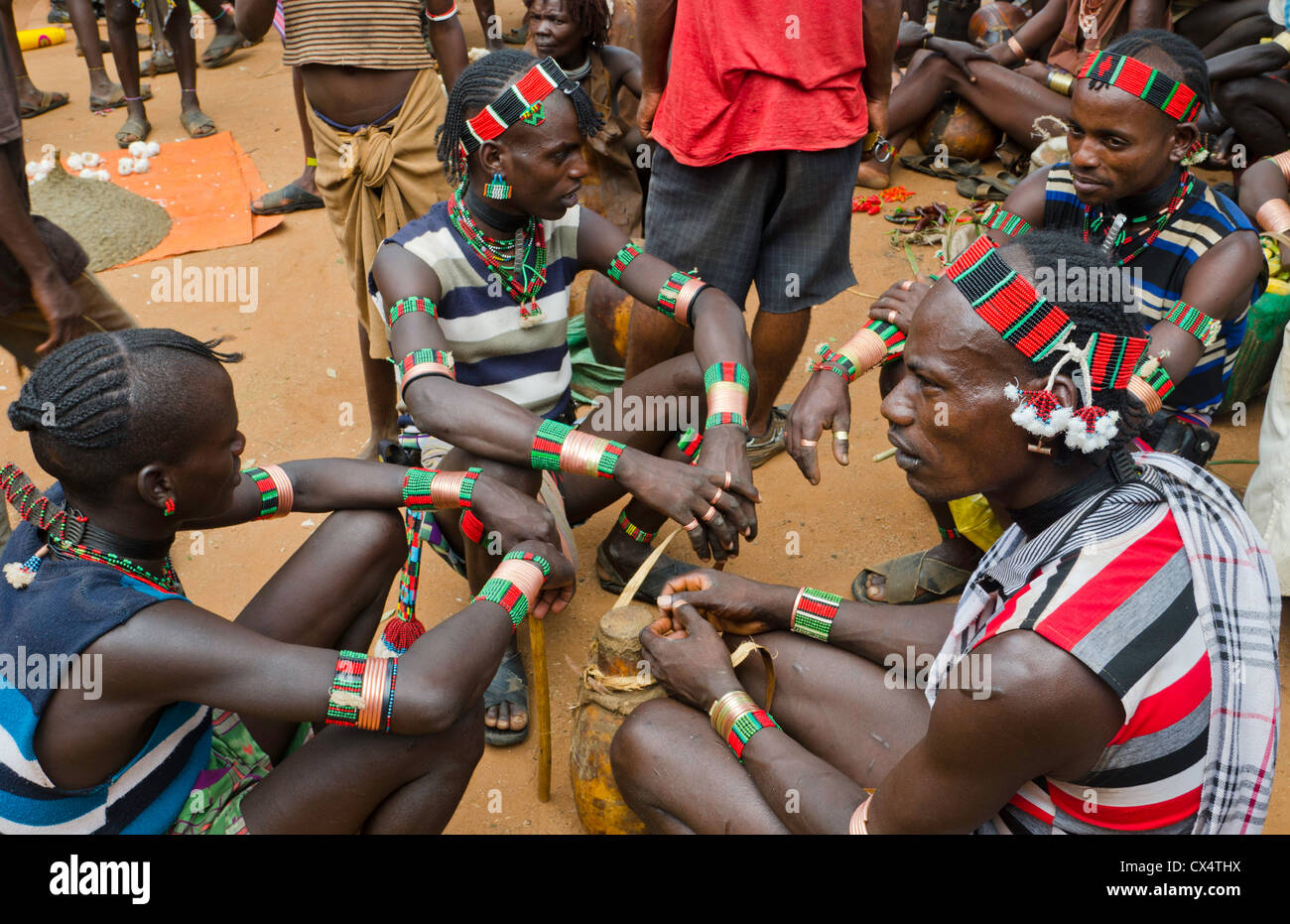 Dimeka Ethiopia Africa Lower Omo Valley market with Bena boys talking ...