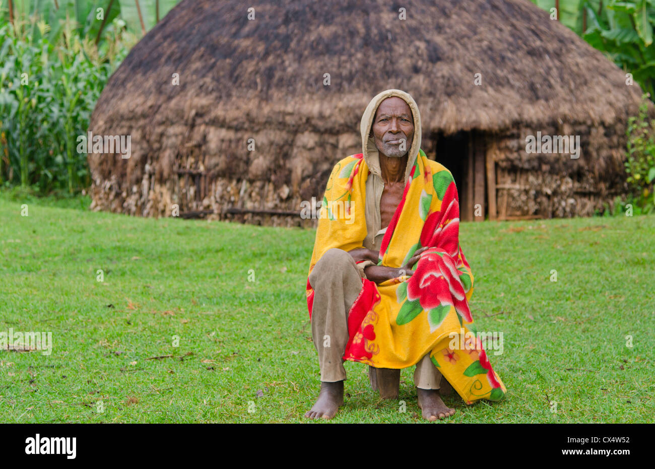 Sidama Tribe Ethiopia Africa old man age 82 with his hut home with scarf in Lower Omo Valley #30 ...