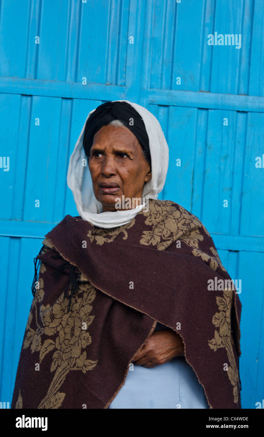 Addis Ababa Ethiopia Capital Africa local woman against blue door with ...