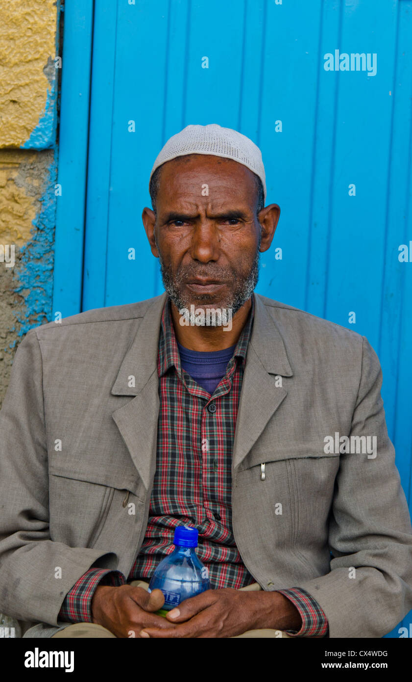 Addis Ababa Ethiopia Capital Africa local man against blue door with ...