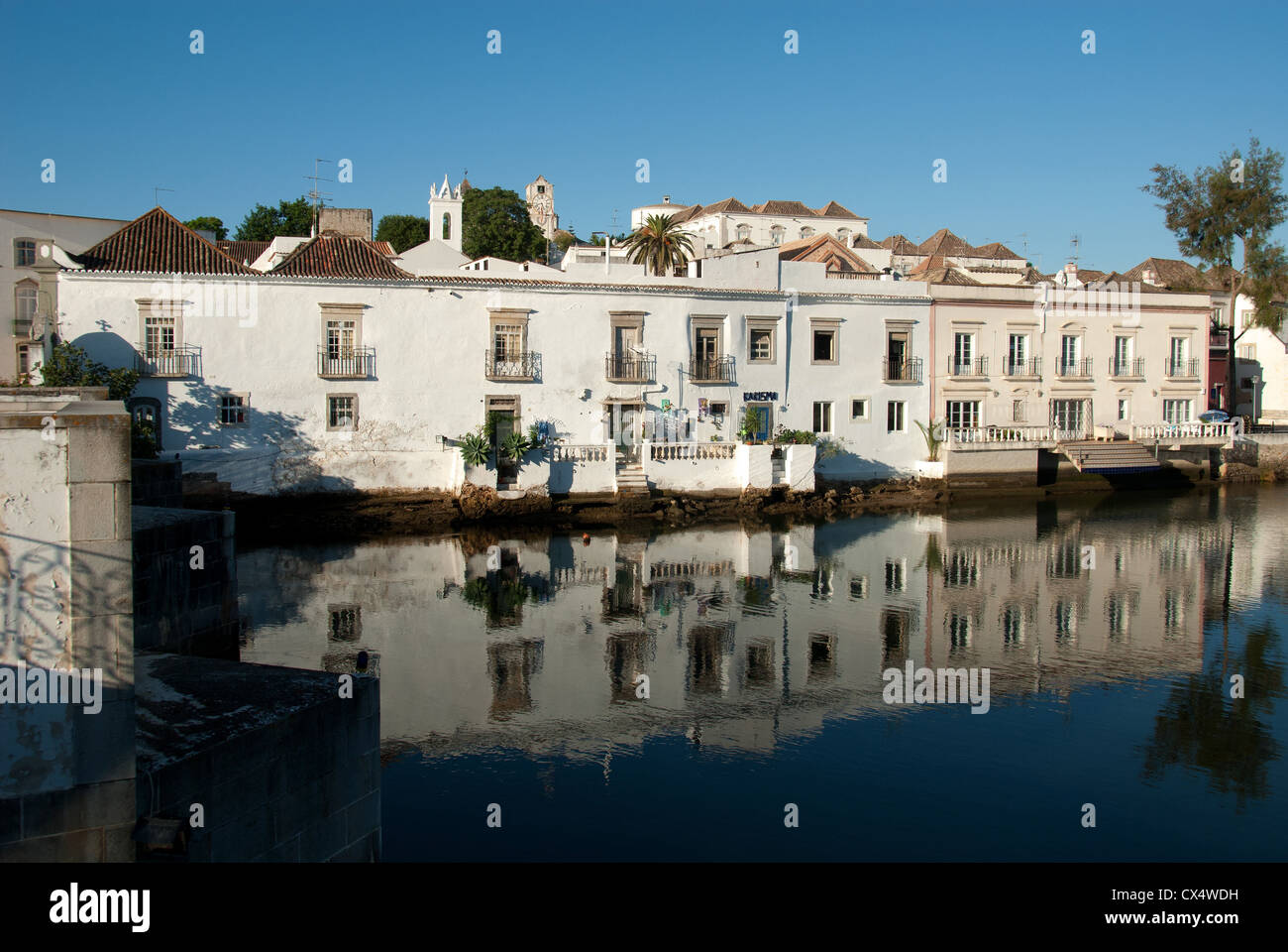 ALGARVE, PORTUGAL. The historic town of Tavira on the banks of the Rio ...