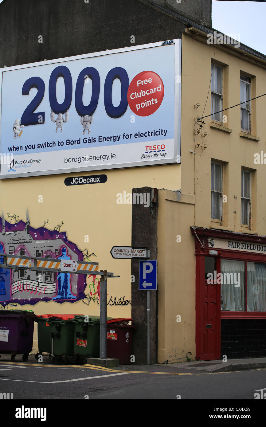 co county kerry, advertising hording on street side building Stock ...