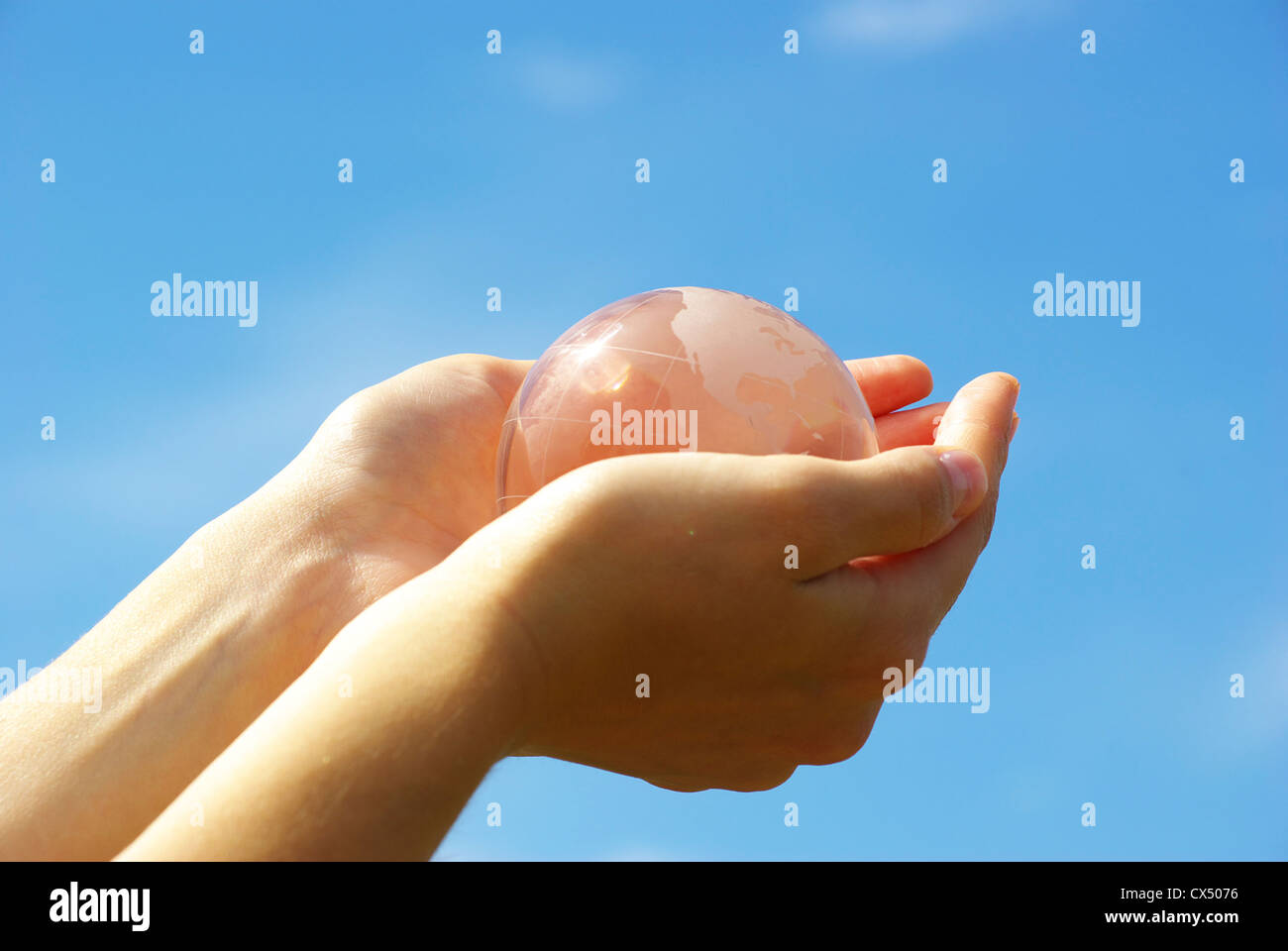 globe on the human hand Stock Photo - Alamy