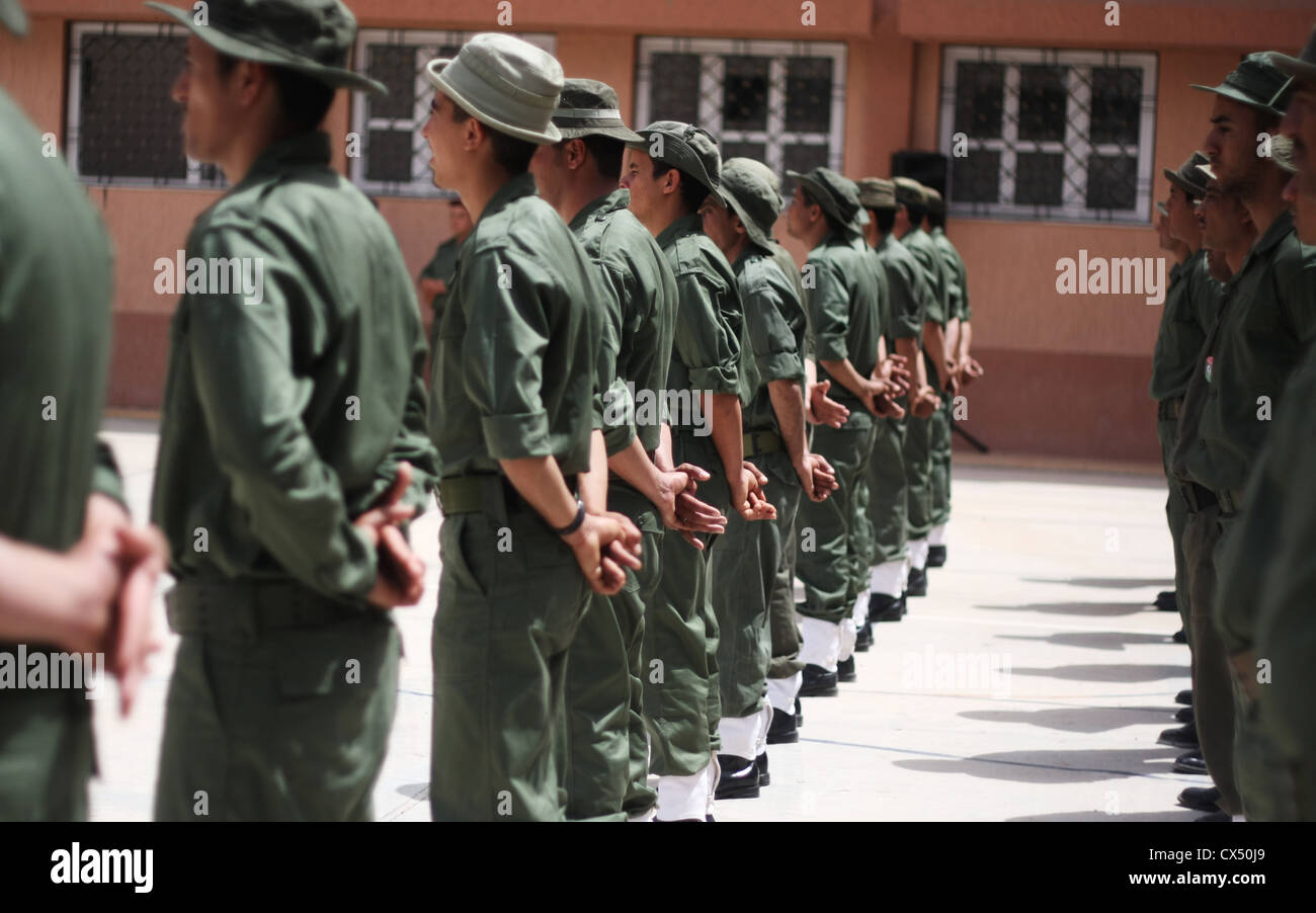 Members of Misrata's police force attend a graduation ceremony as heavy ...