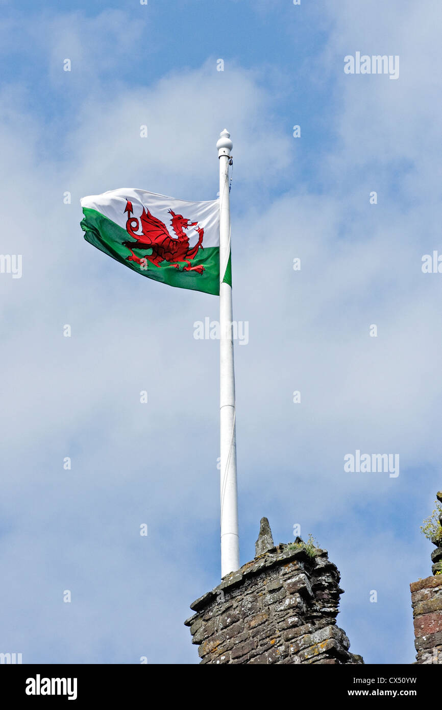 A Welsh Flag flying from the battlements of Conwy Castle Stock Photo ...