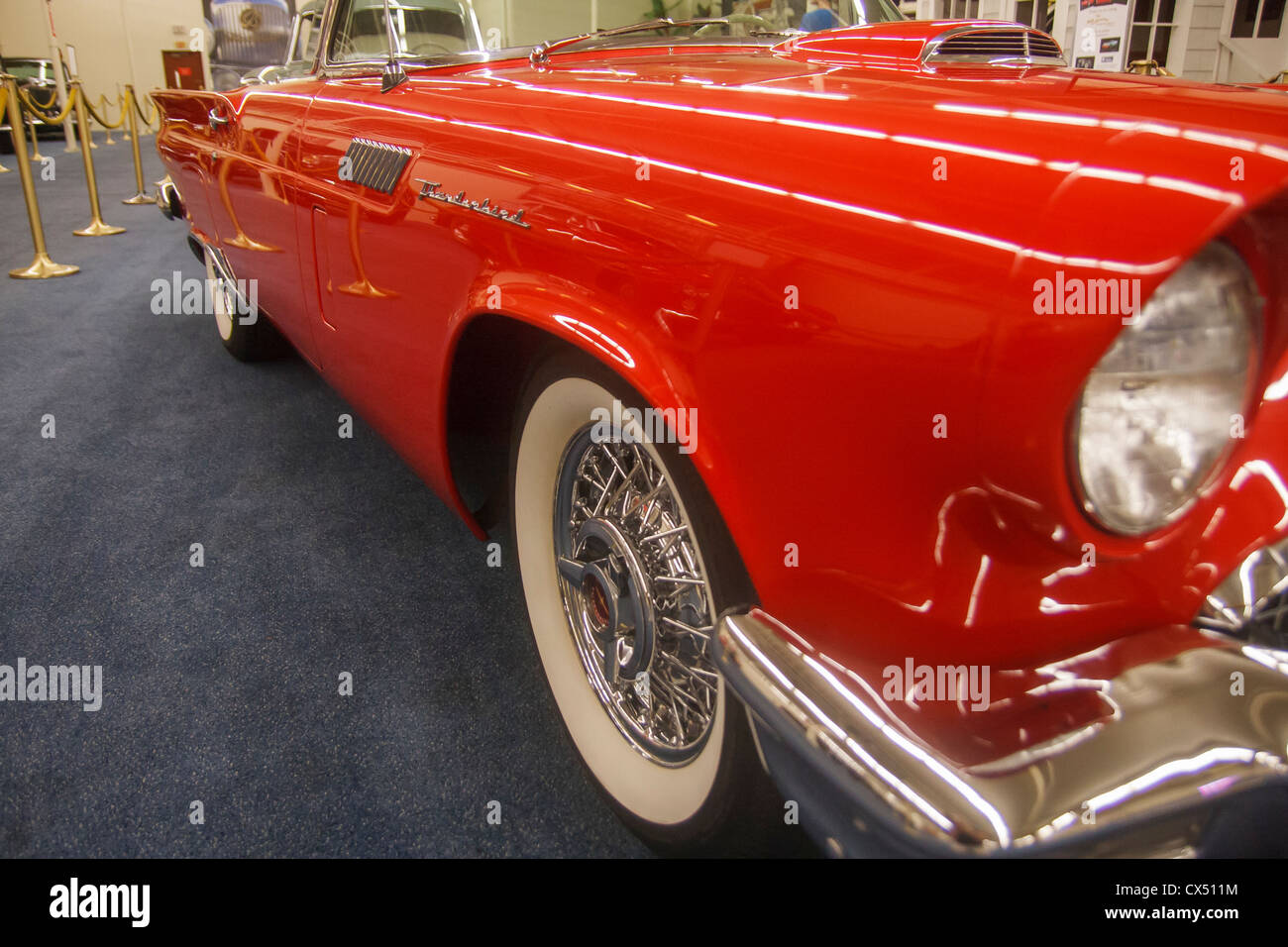 Front Fender of a Classic Red Thunderbird in a Showroom Stock Photo - Alamy