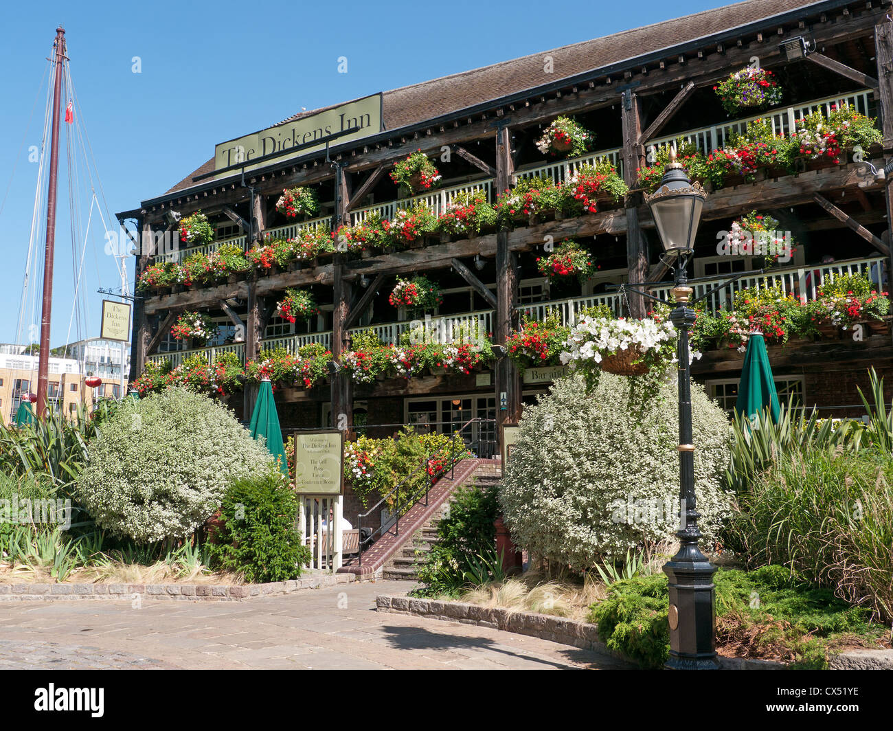 The Dickens Inn in St. Katherine Docks, London by Tower Bridge Stock ...
