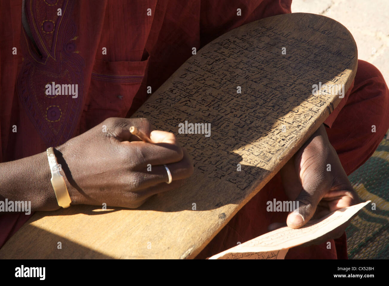 Writing the Koran on a wooden, Timbuktu, Mali, West Africa Stock Photo ...