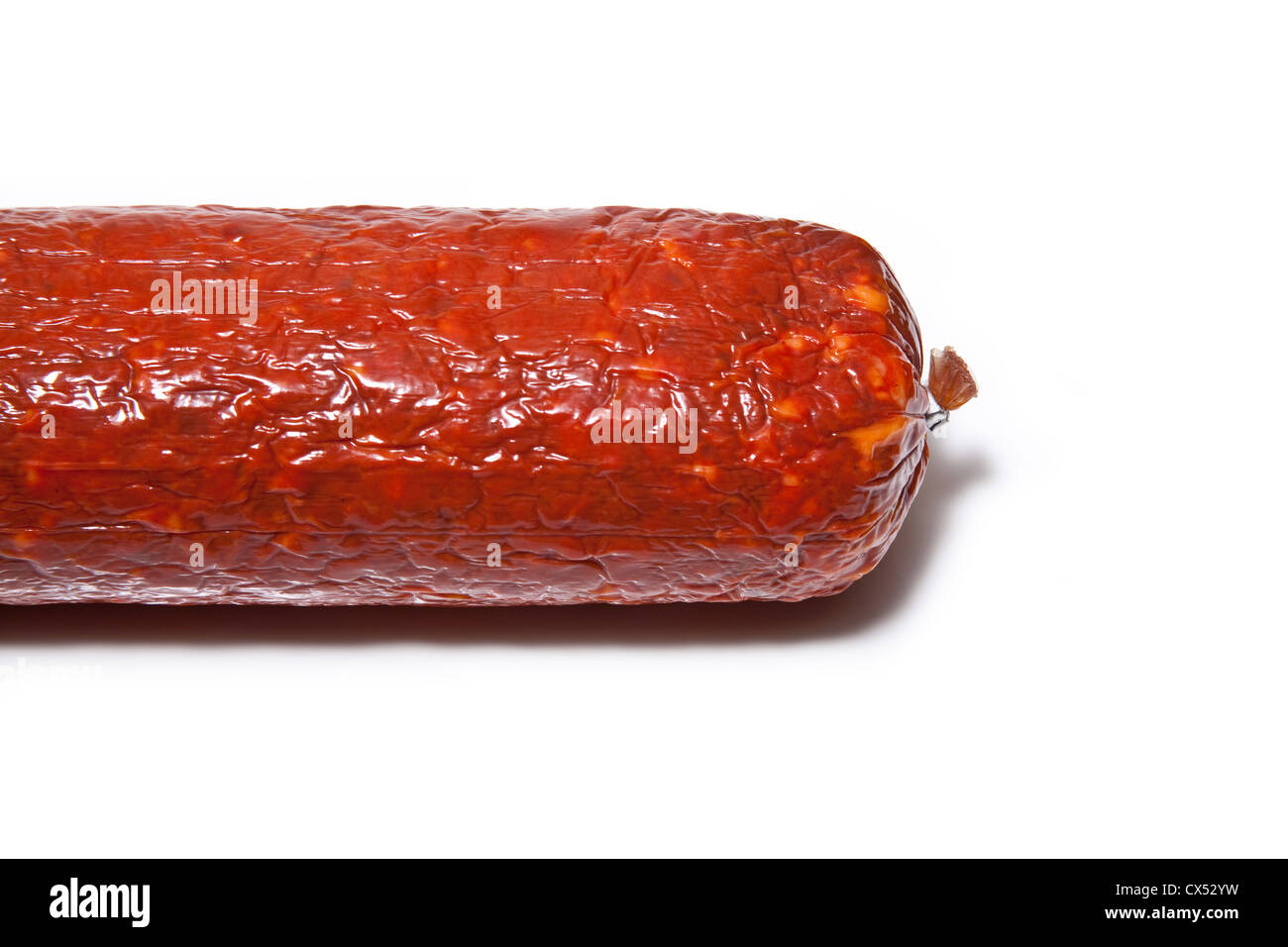 Large Spanish Chorizo sausage isolated on a white studio background ...
