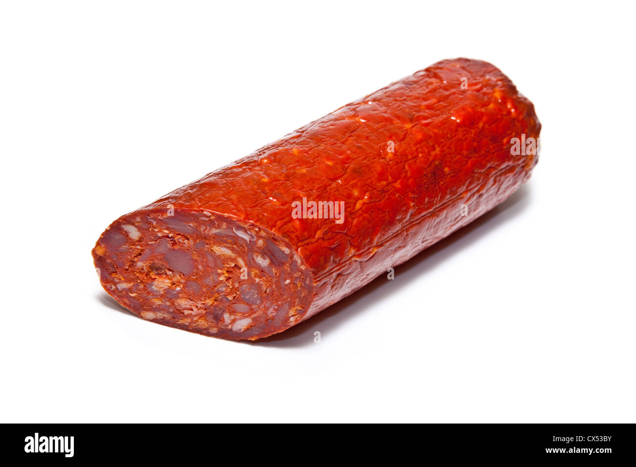 Large Spanish Chorizo sausage isolated on a white studio background ...