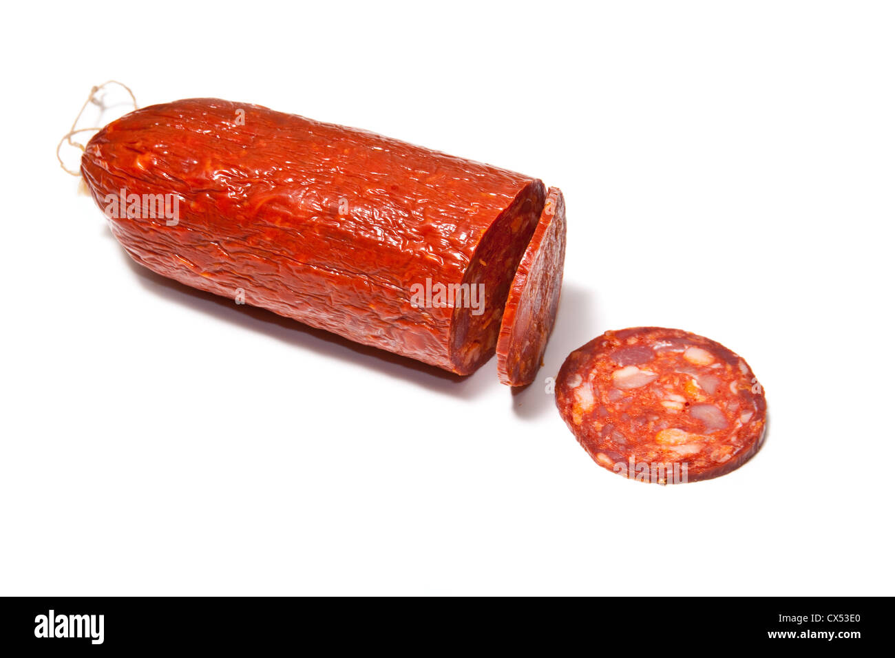 Large Spanish Chorizo sausage isolated on a white studio background ...