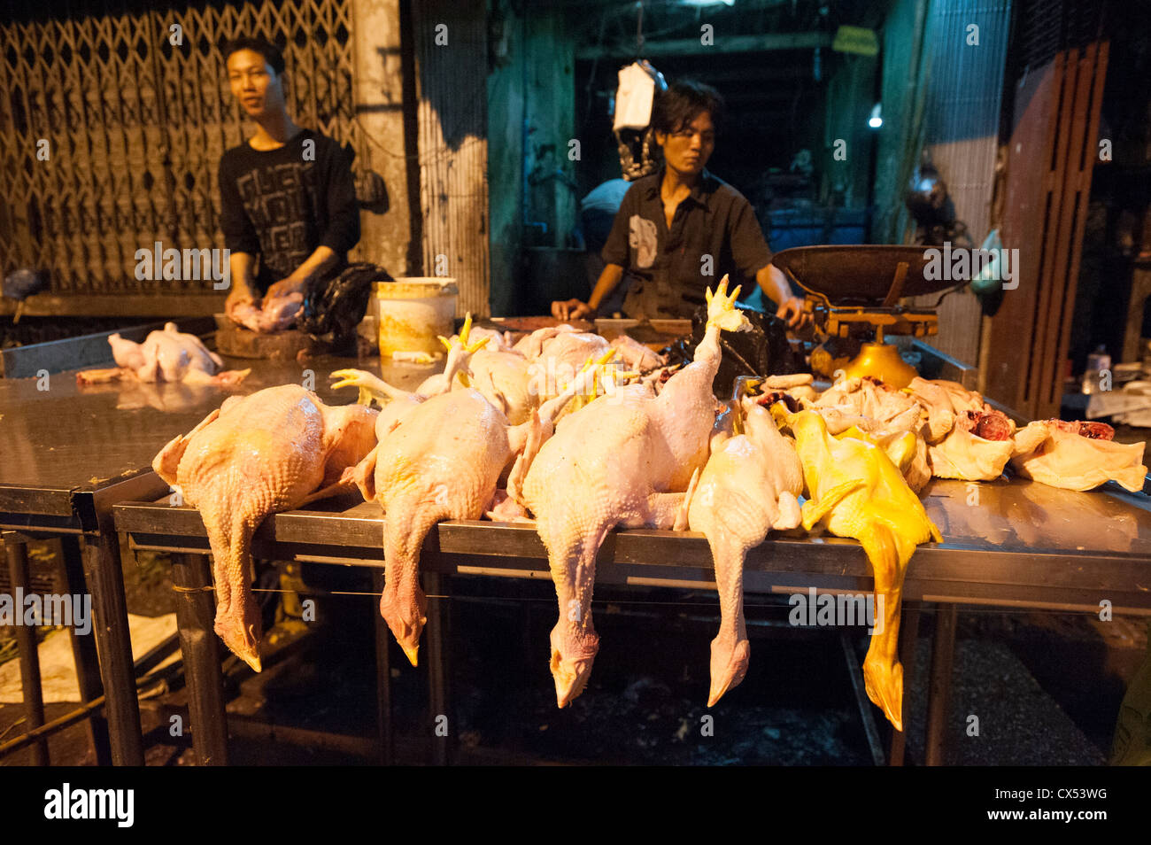 Selling chickens at Bogyoke Aung San Market at night, Yangon (Rangoon), Myanmar (Burma Stock ...