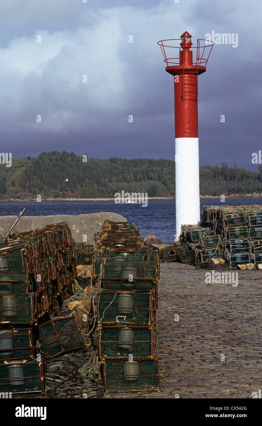 shellfish traps and lighthouse in Camarinas Galicia Spain Stock Photo ...