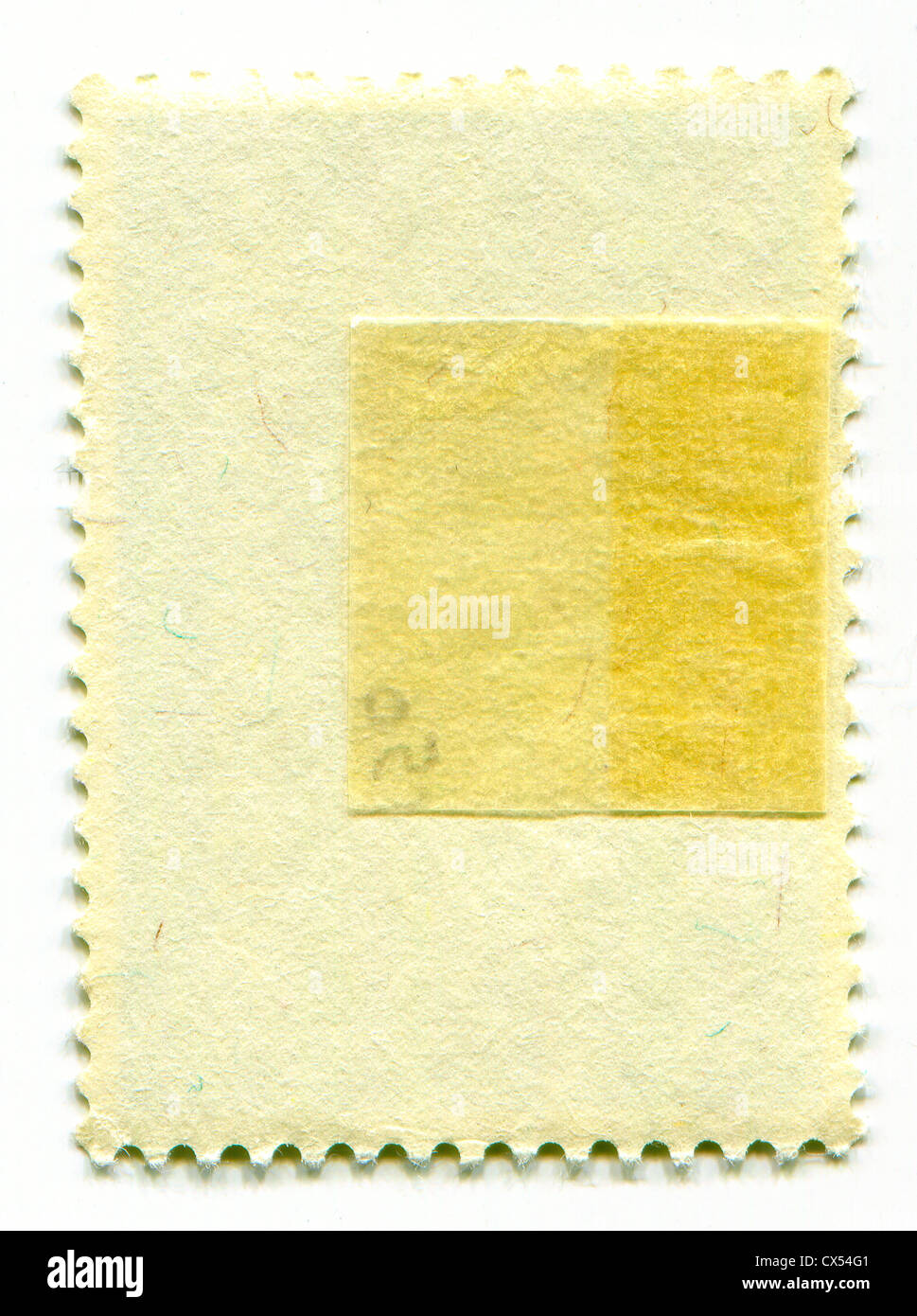 The reverse side of a postage stamp Stock Photo - Alamy