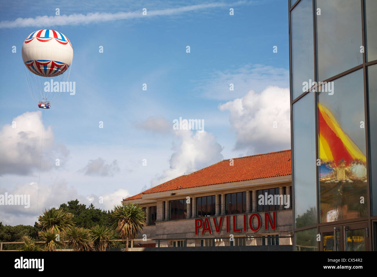 Bournemouth Eye balloon, Pavilion and fairground reflections in Imax ...