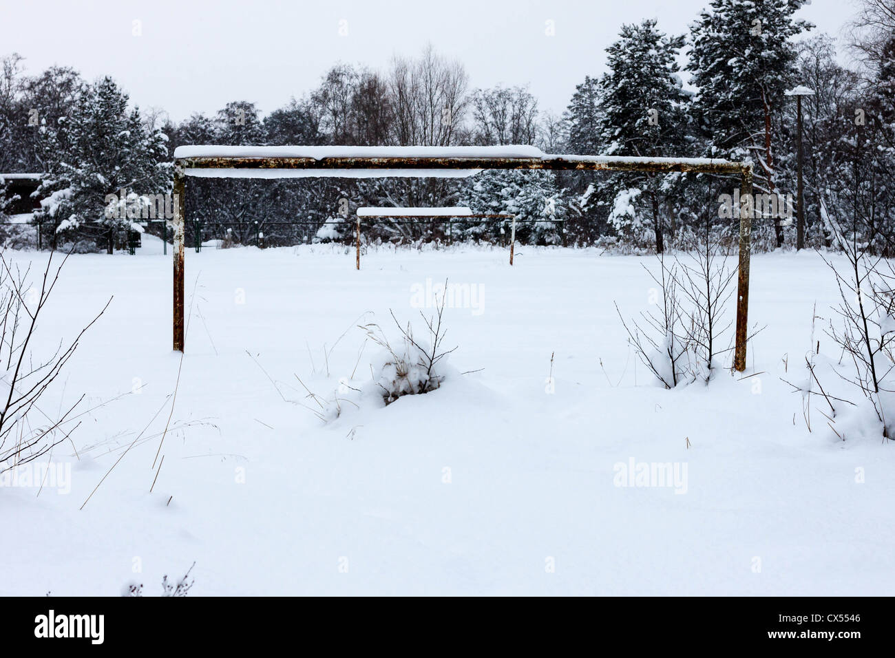 Football pitch (soccer field) in winter snow Stock Photo - Alamy
