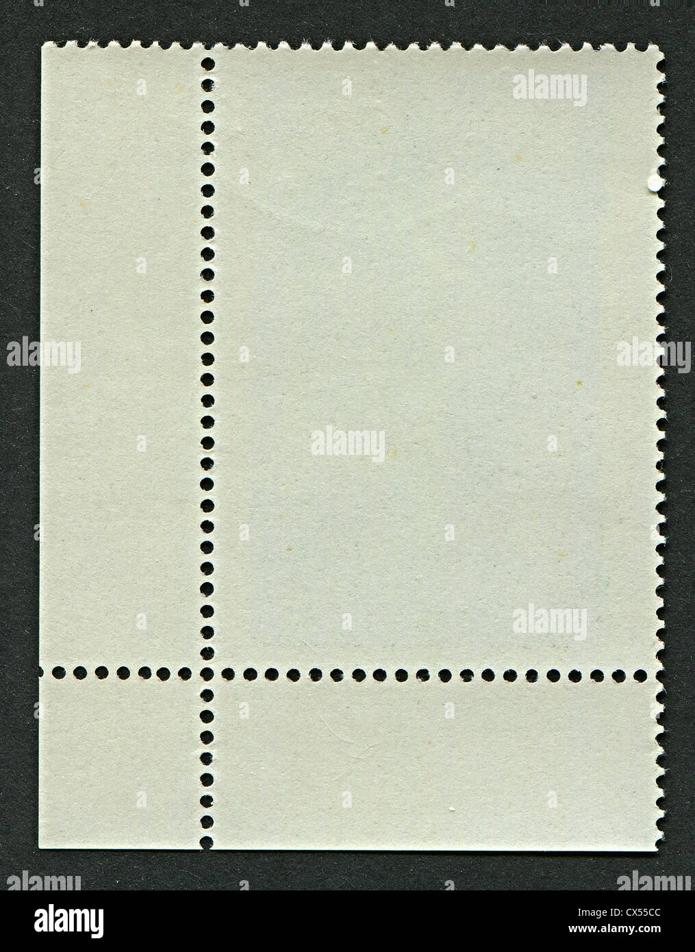 The reverse side of a postage stamp Stock Photo - Alamy
