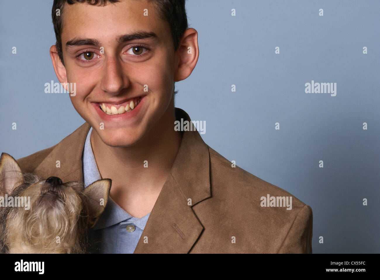 Teen boy and dog portrait Stock Photo - Alamy