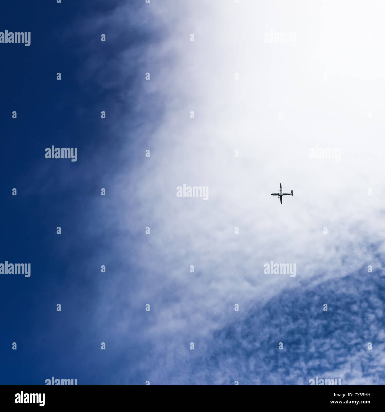 Clear propeller aircraft in blue sky Stock Photo - Alamy