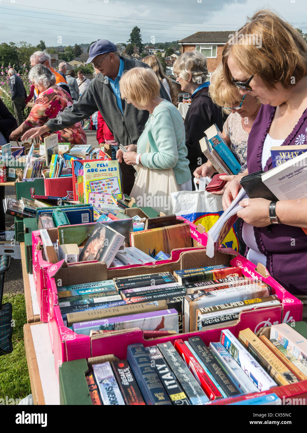 BOOK STALL AT CHURCH FETE WITH PEOPLE BROWSING THROUGH BOOKS ...