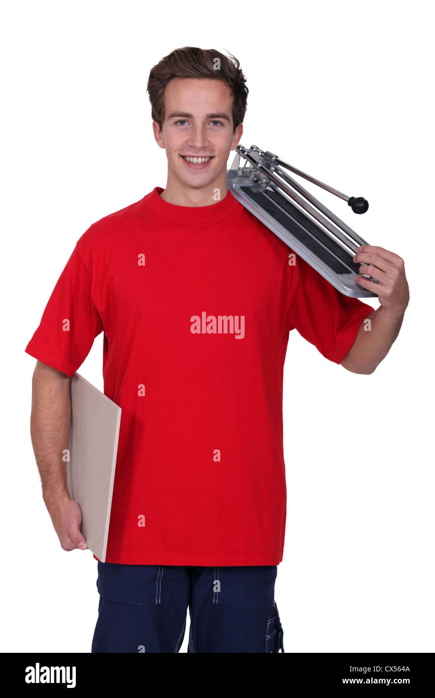 Man holding a tool Stock Photo - Alamy