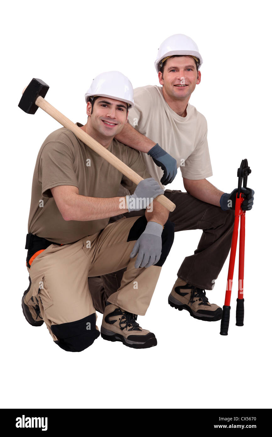 Workmen with helmets Cut Out Stock Images & Pictures - Alamy
