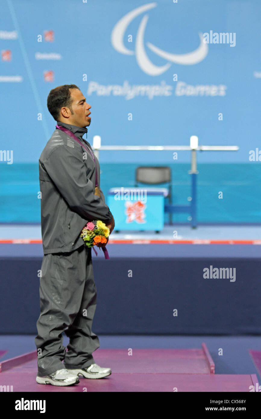 Sherif Othman of Egypt winning the gold in the mens 56kg powerlifting competition at the London ...