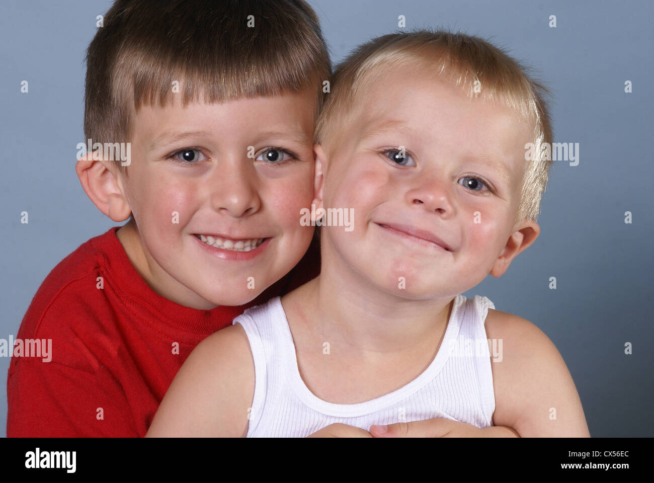 Young brothers smile for their portrait Stock Photo - Alamy