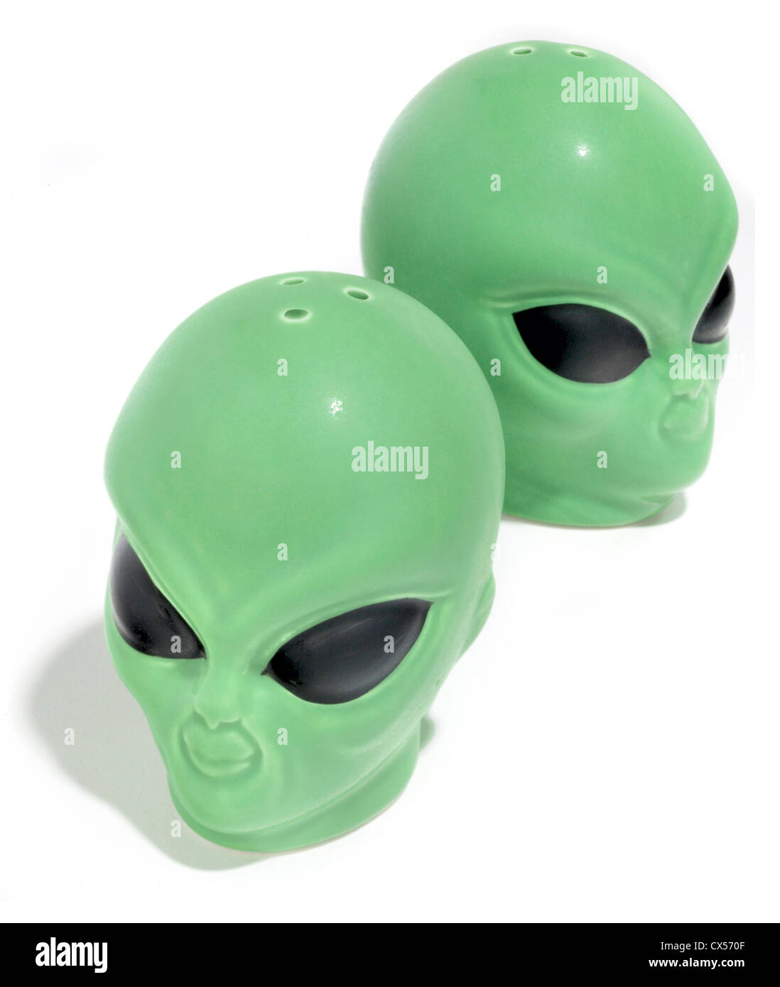 alien salt and pepper shaker photographed on a white background Stock ...