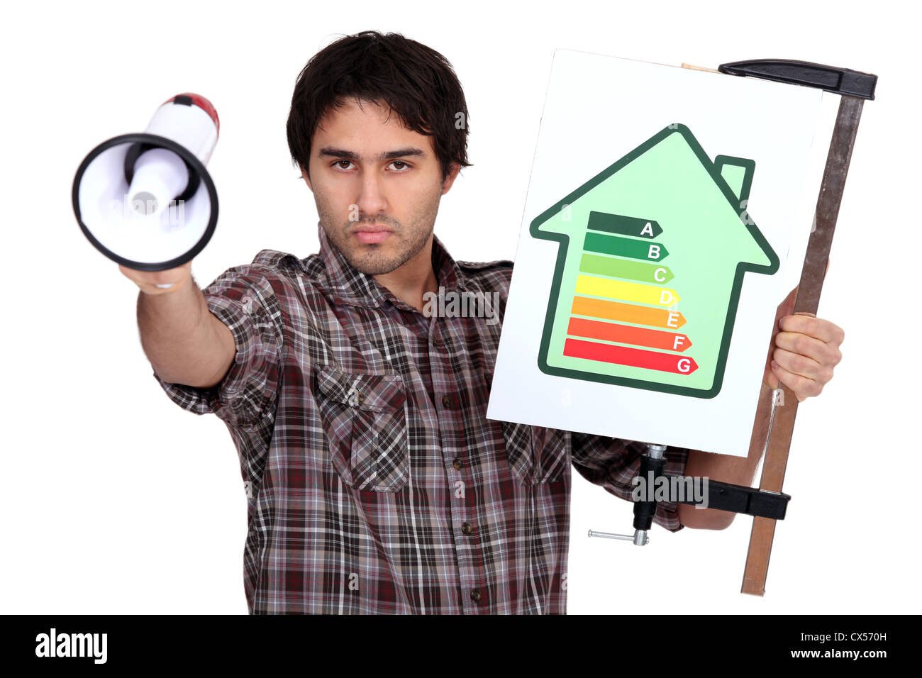 Young man with bullhorn showing Stock Photo - Alamy