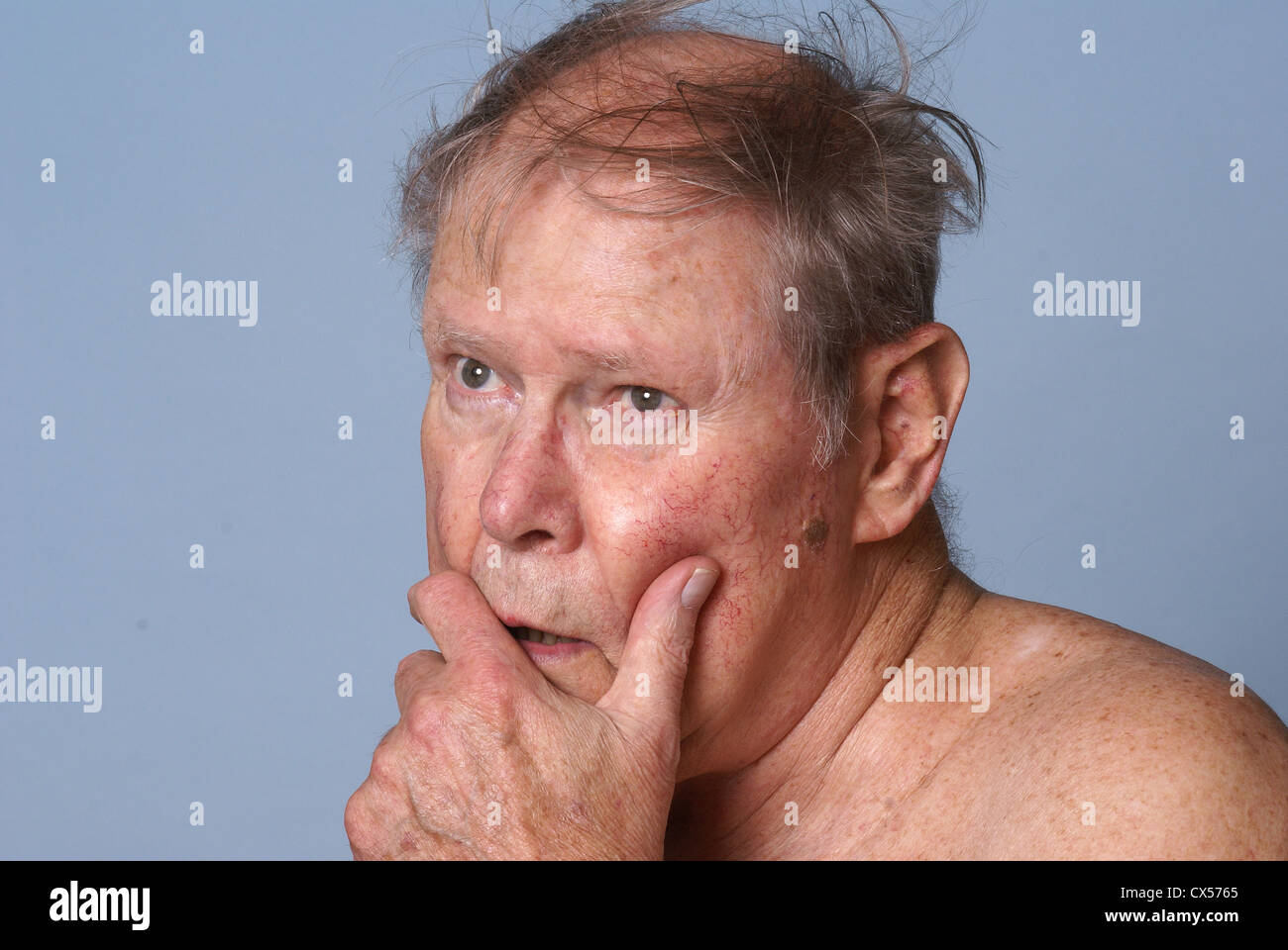 Face of confused old man Stock Photo - Alamy