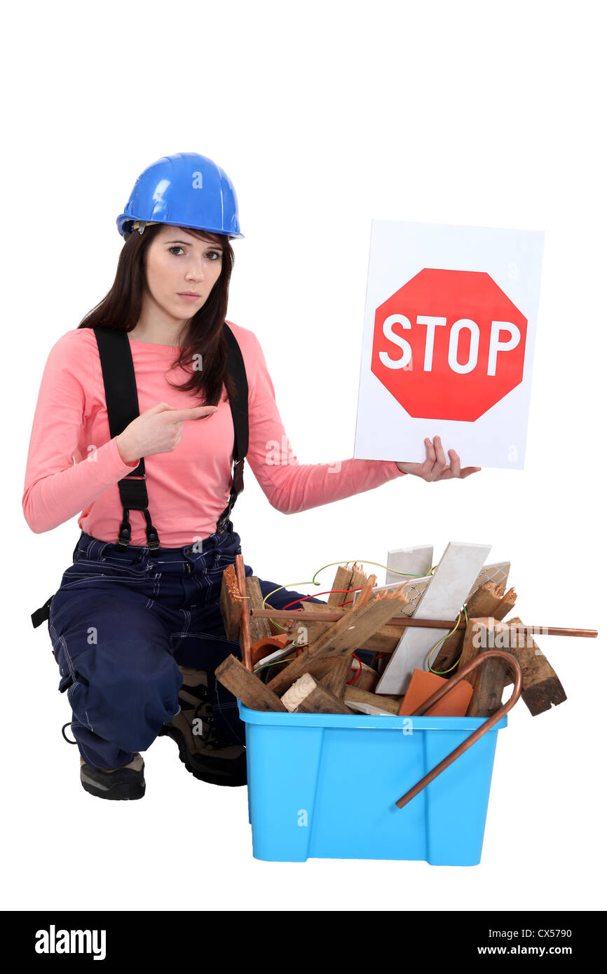 Woman holding sign stop Cut Out Stock Images & Pictures - Alamy