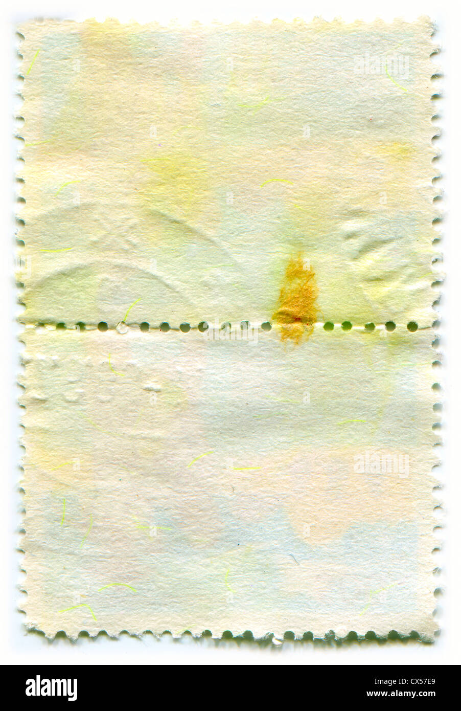 The reverse side of a postage stamp Stock Photo - Alamy