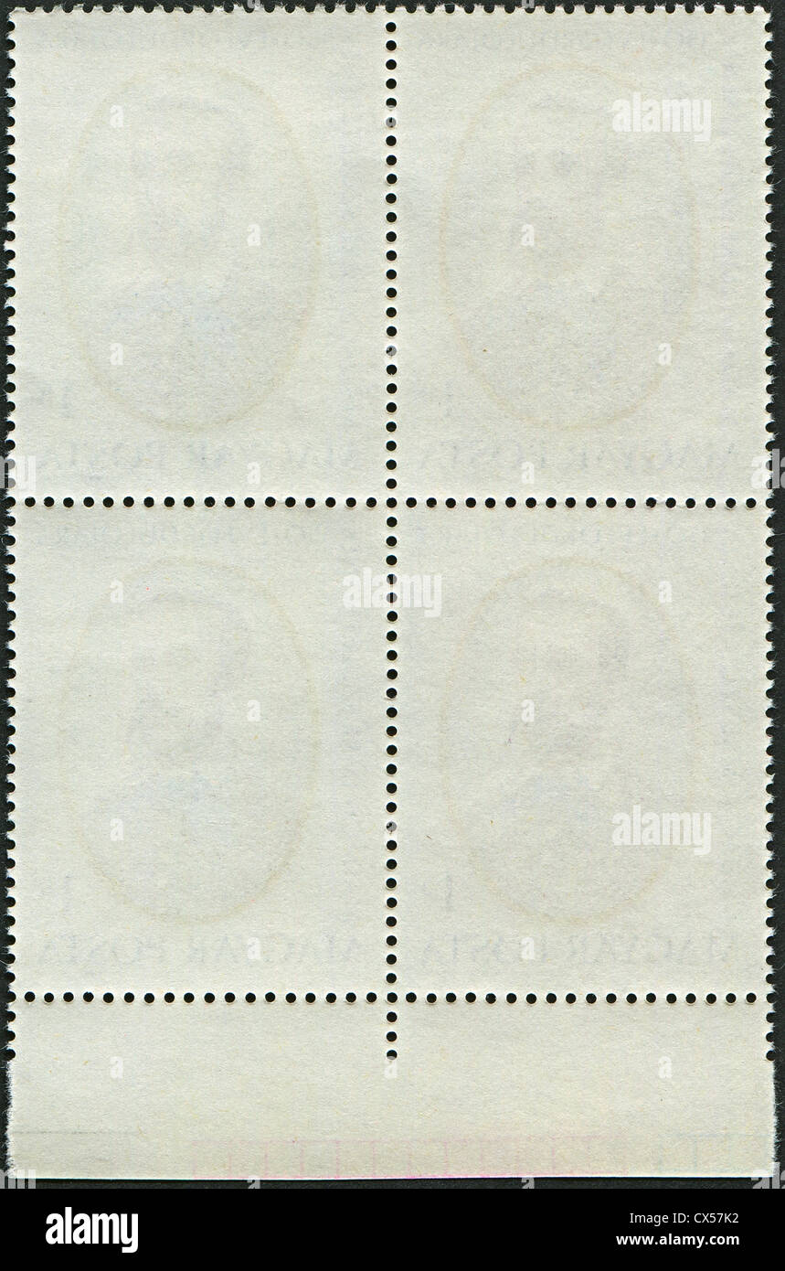 The reverse side of a postage stamp Stock Photo - Alamy