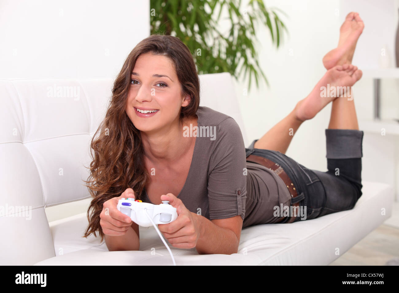 Woman playing computer games Stock Photo - Alamy