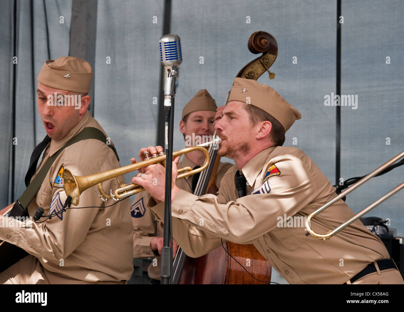 A small 1940's style jazz band live on stage Stock Photo - Alamy