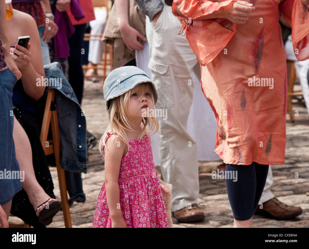 Small crowd watching hi-res stock photography and images - Alamy