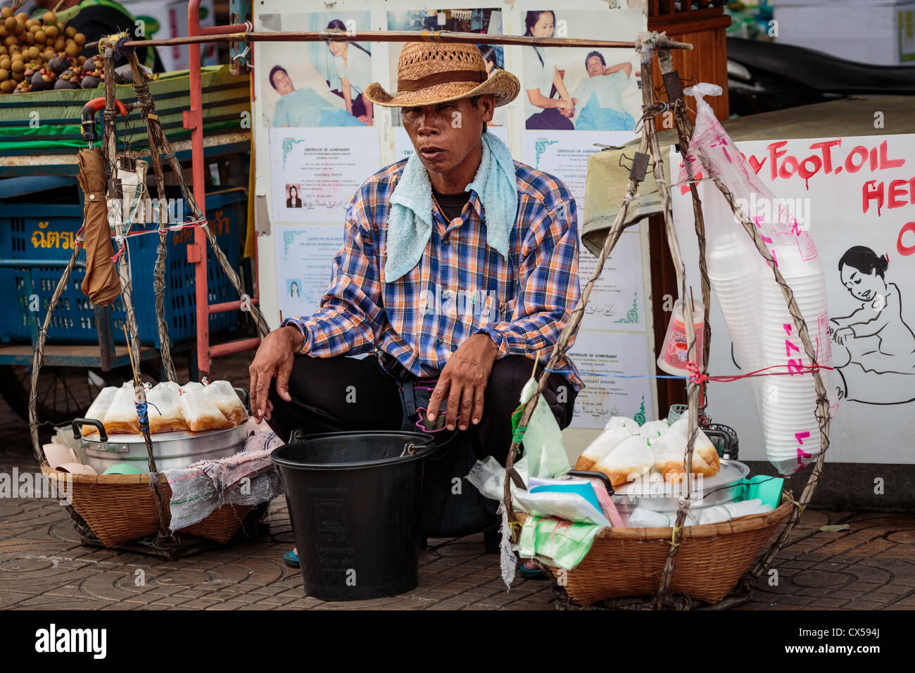 Street vendor selling small snacks, Bangkok, Thailand Stock Photo - Alamy