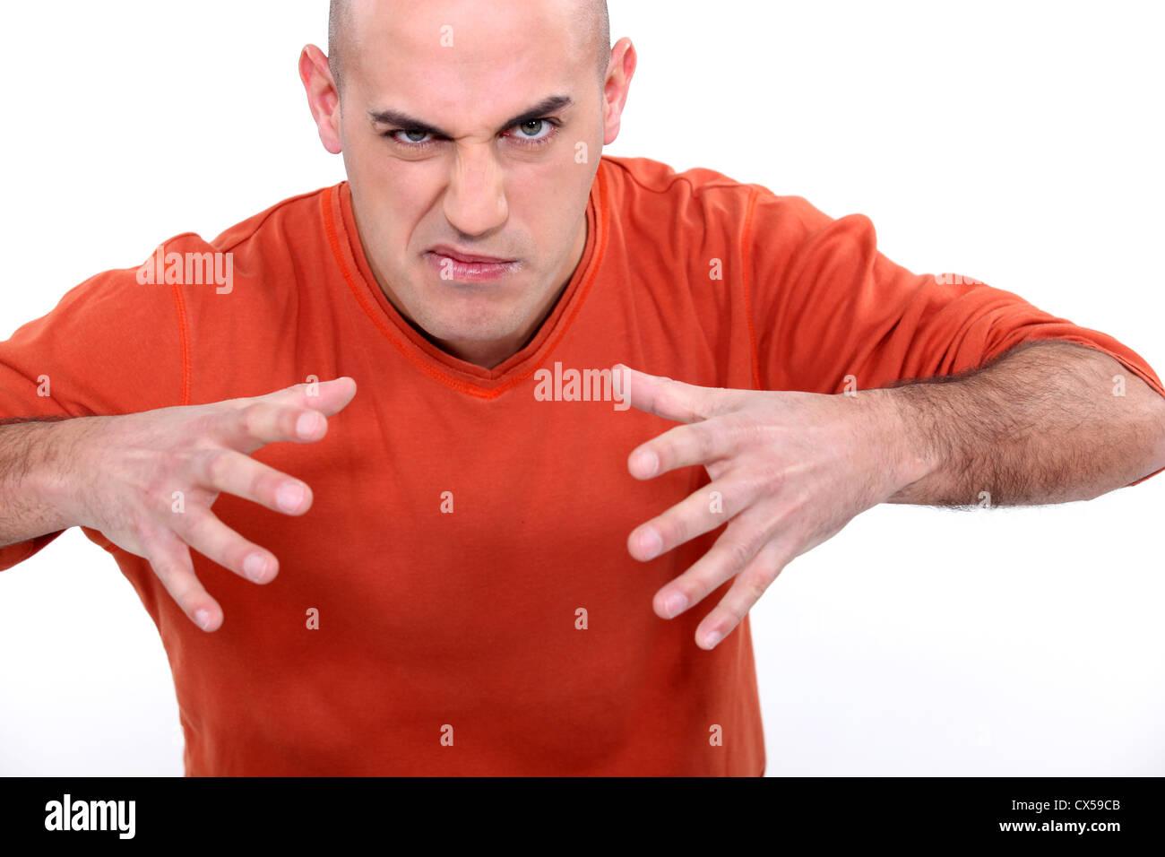 Angry young bald man Stock Photo - Alamy