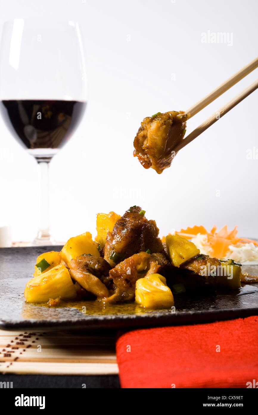 eating Chinese food with chopsticks Stock Photo - Alamy