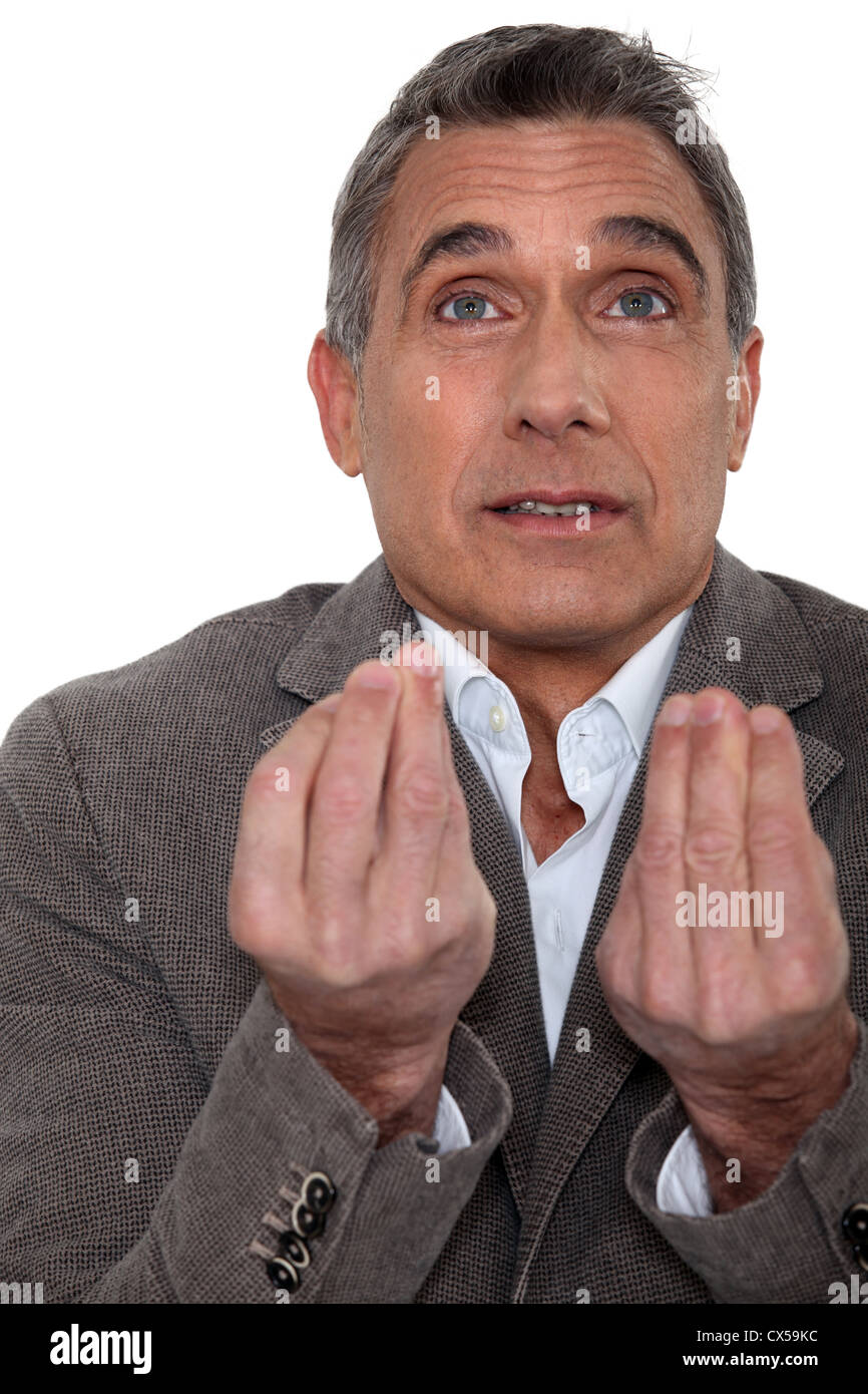 Senior businessman asking question Stock Photo - Alamy