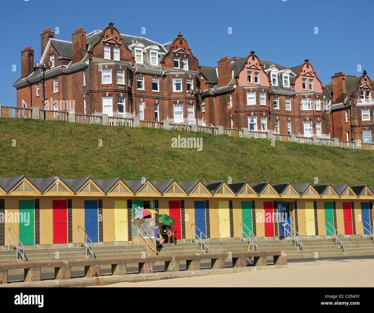A colourful line of traditional beach huts adorn the South Beach and ...