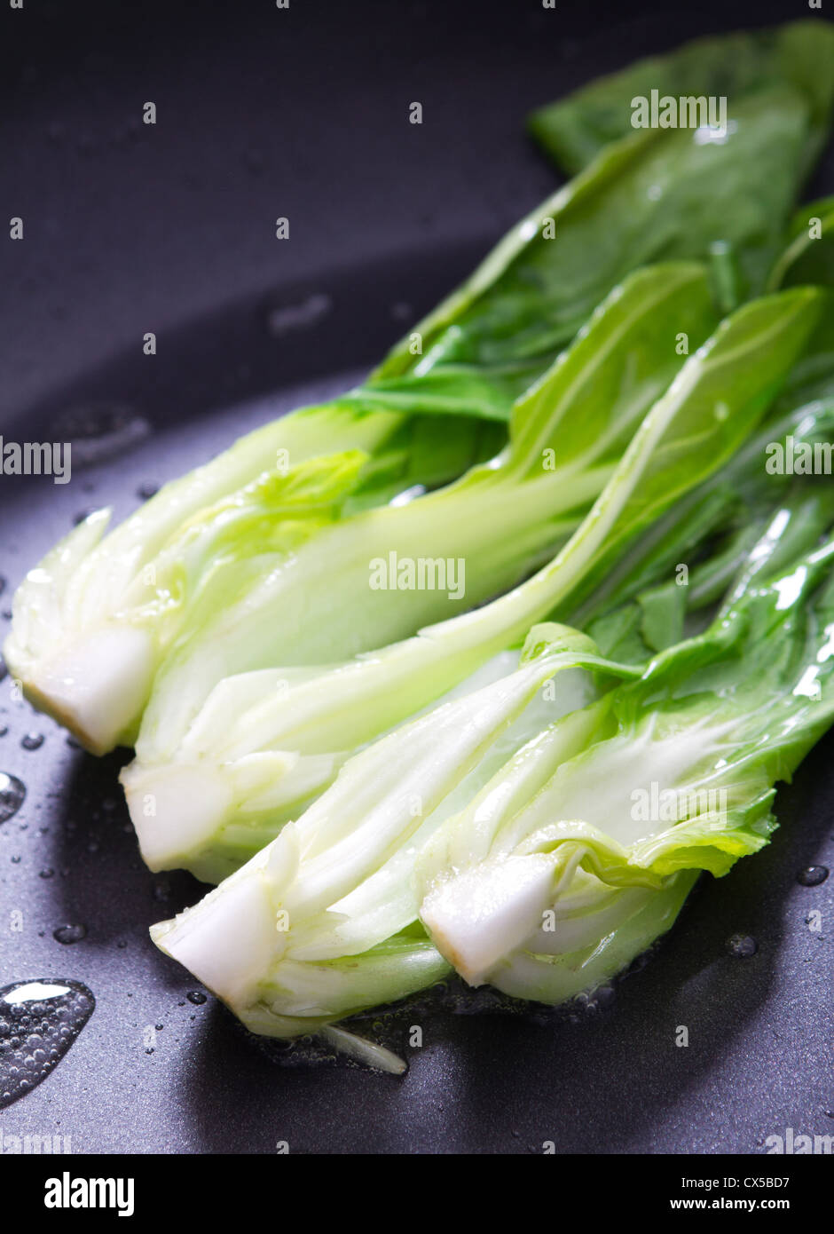 bok choy stir fry on pan Stock Photo - Alamy