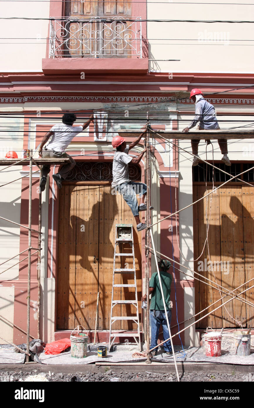 Workmen restoring buildings in the The UNESCO [World Heritage Site] of ...