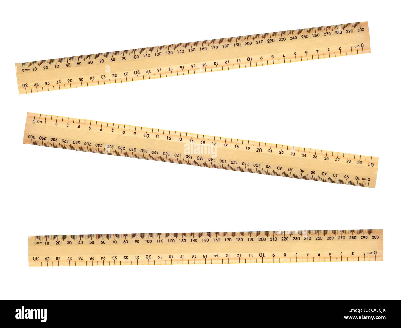 A metal ruler isolated against a white background Stock Photo - Alamy